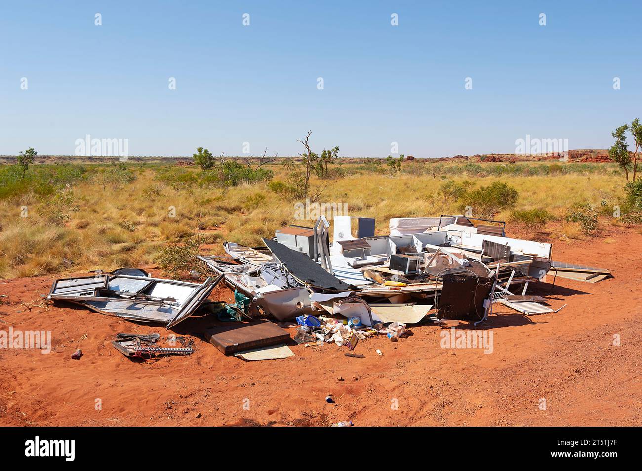 A destroyed caravan on a dirt road in the Pilbara, a mining region in ...