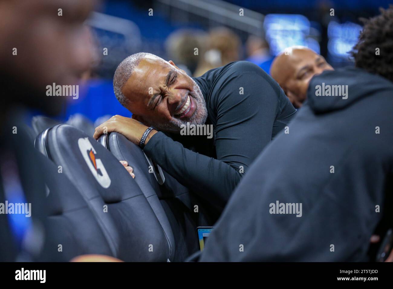 Los Angeles Lakers assistant coach Phil Handy laughs with a player ...