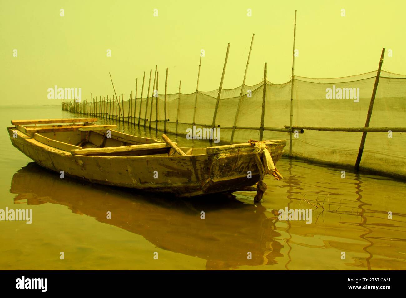 broken wooden stakes and nets Stock Photo - Alamy