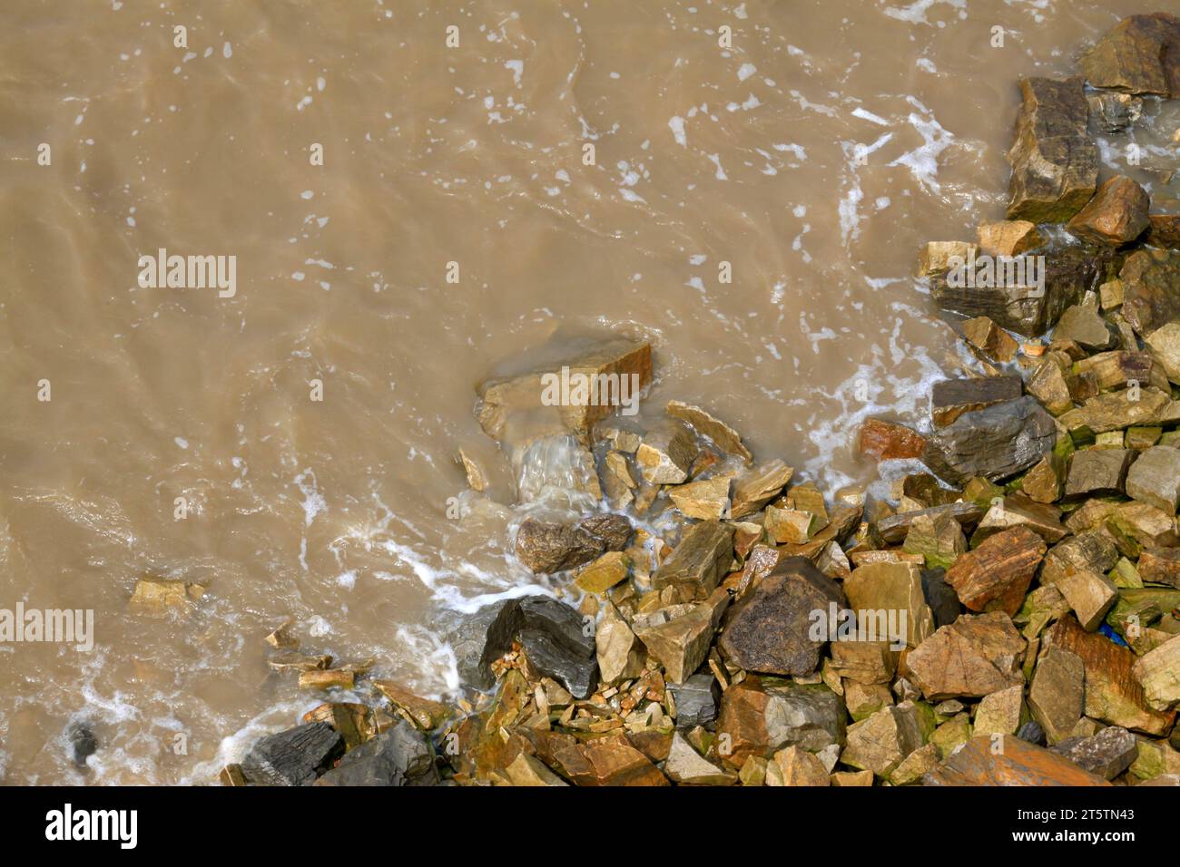 Gravel by water Stock Photo - Alamy