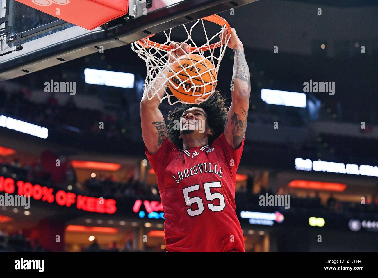 Louisville guard Skyy Clark (55) dunks the ball during the second half ...