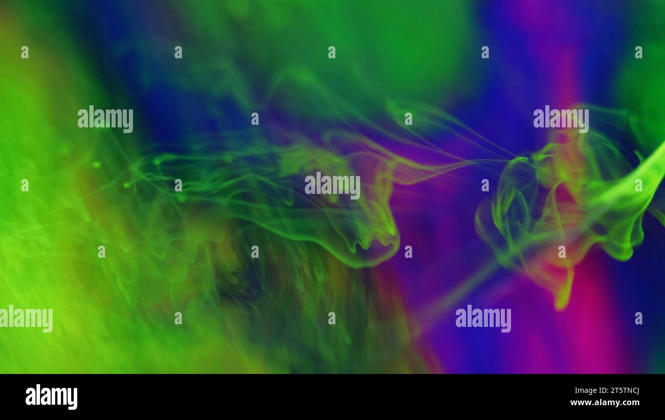 Neon mist floating paint water flow green purple Stock Photo - Alamy