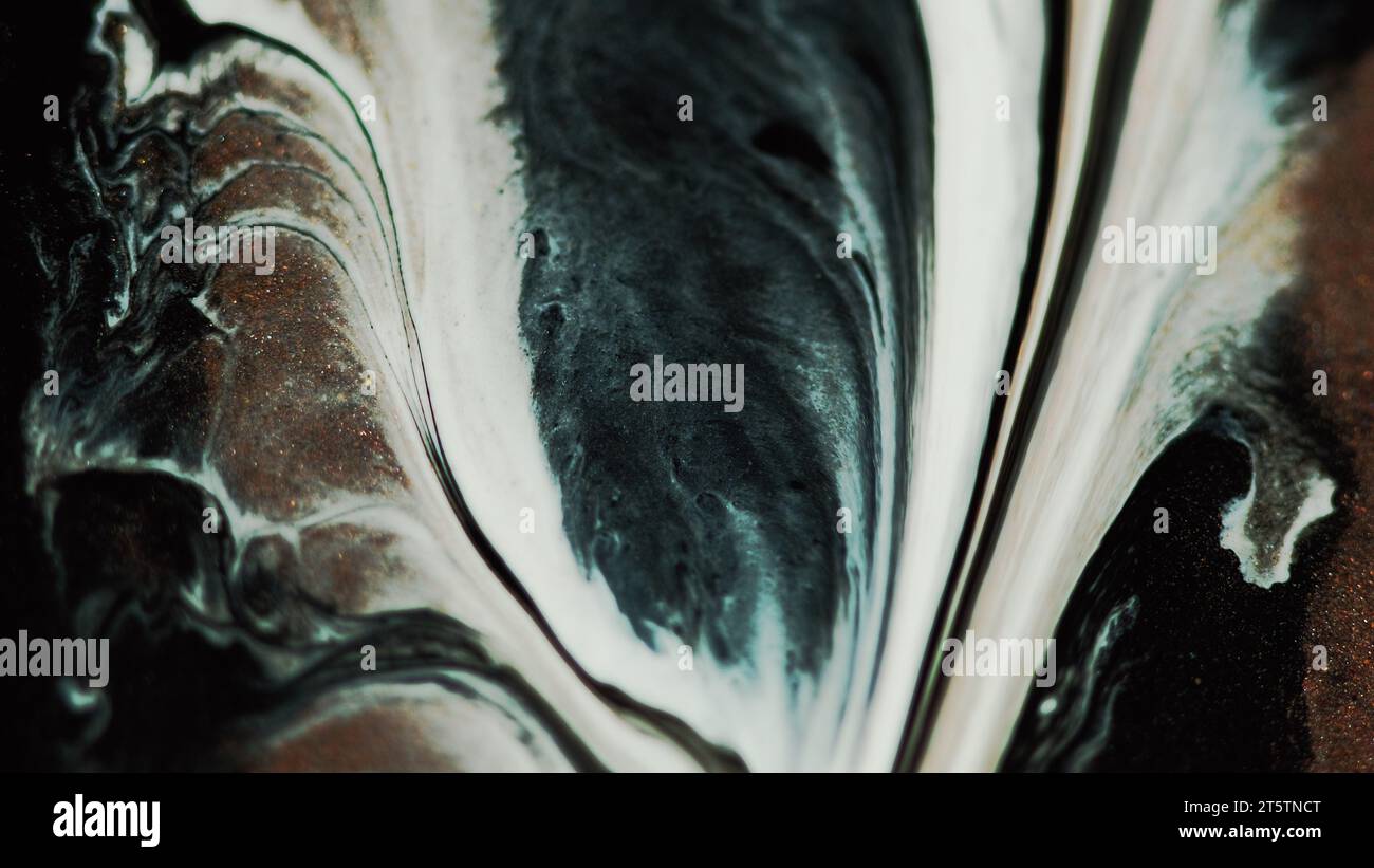 Glitter fluid ink pouring brown marble paint flow Stock Photo - Alamy