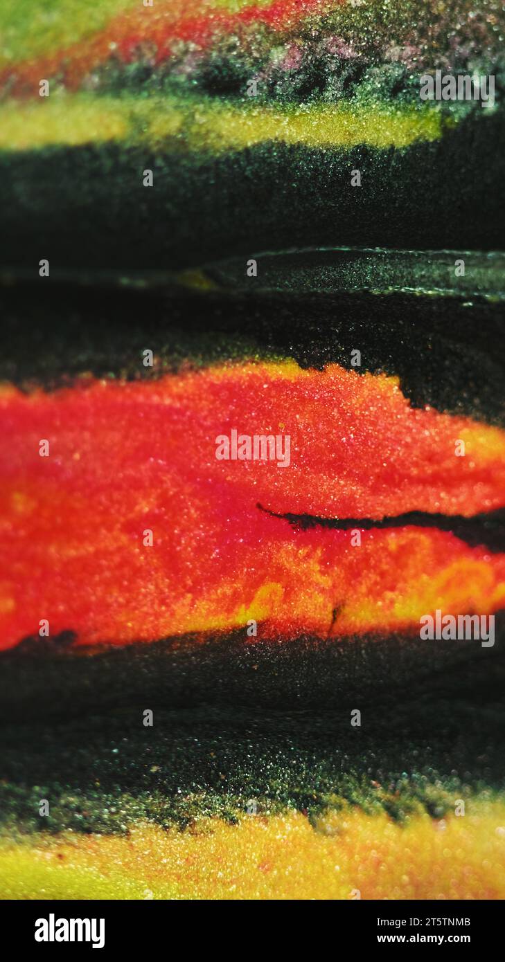 Glitter ink drip paint pouring color fluid spill Stock Photo - Alamy