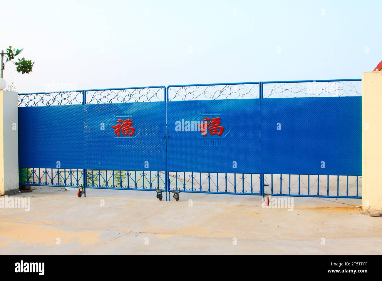 Blue iron gate Stock Photo - Alamy