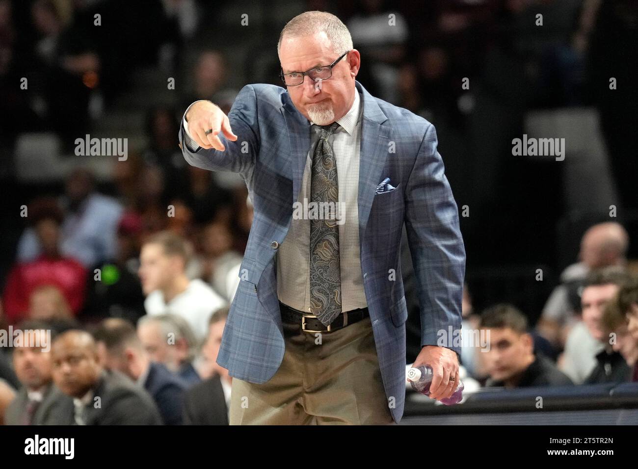 Texas A&M head coach Buzz Williams gestures to his team during a stop ...