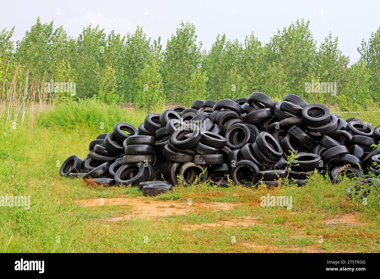 Piles of waste rubber tyre, closeup of photo Stock Photo - Alamy
