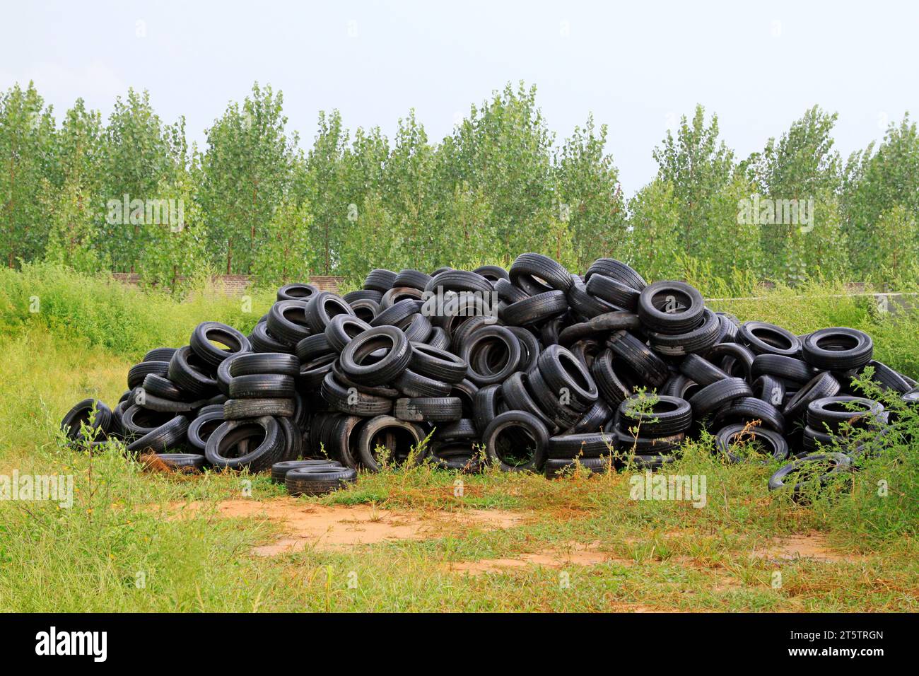 Piles of waste rubber tyre, closeup of photo Stock Photo - Alamy