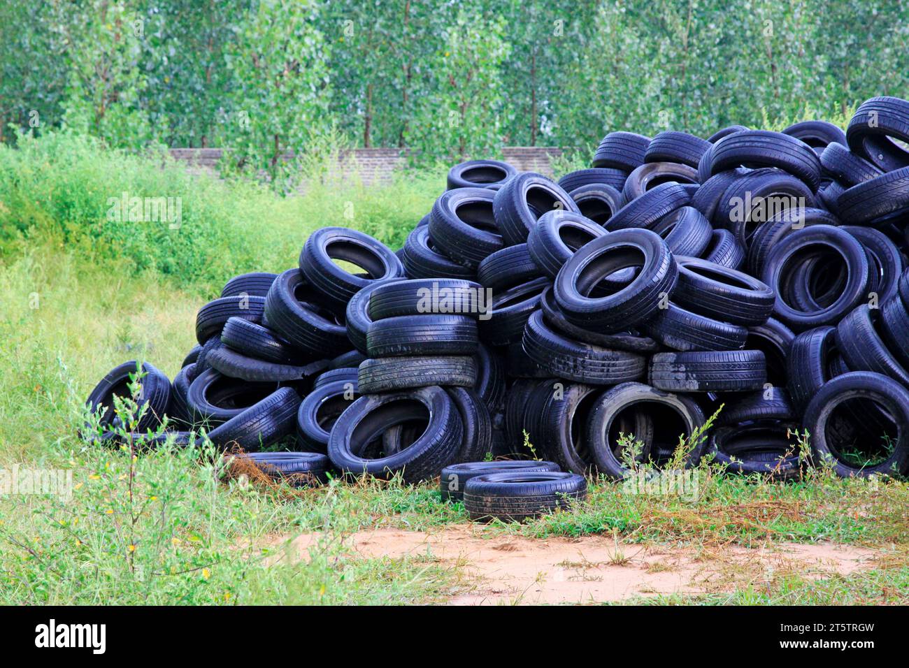 Piles of waste rubber tyre, closeup of photo Stock Photo - Alamy