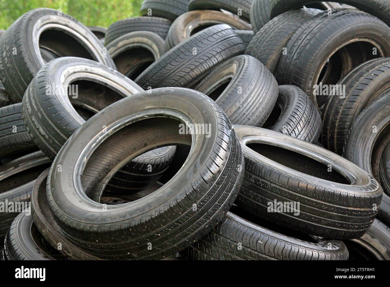 Piles of waste rubber tyre, closeup of photo Stock Photo - Alamy