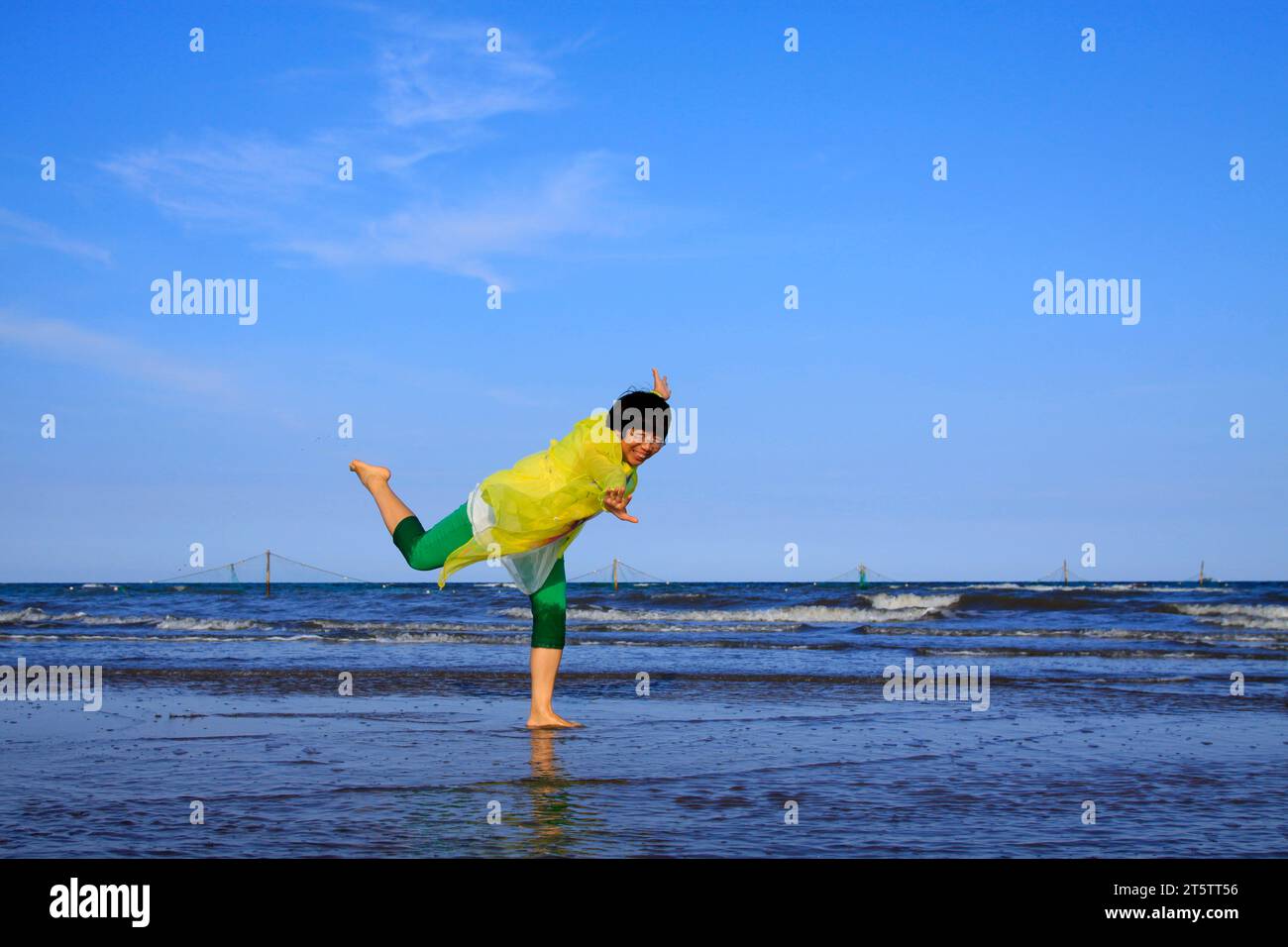 JINGTANG PORT - AUGUST 29: a lady standing at the sea beach, on August ...
