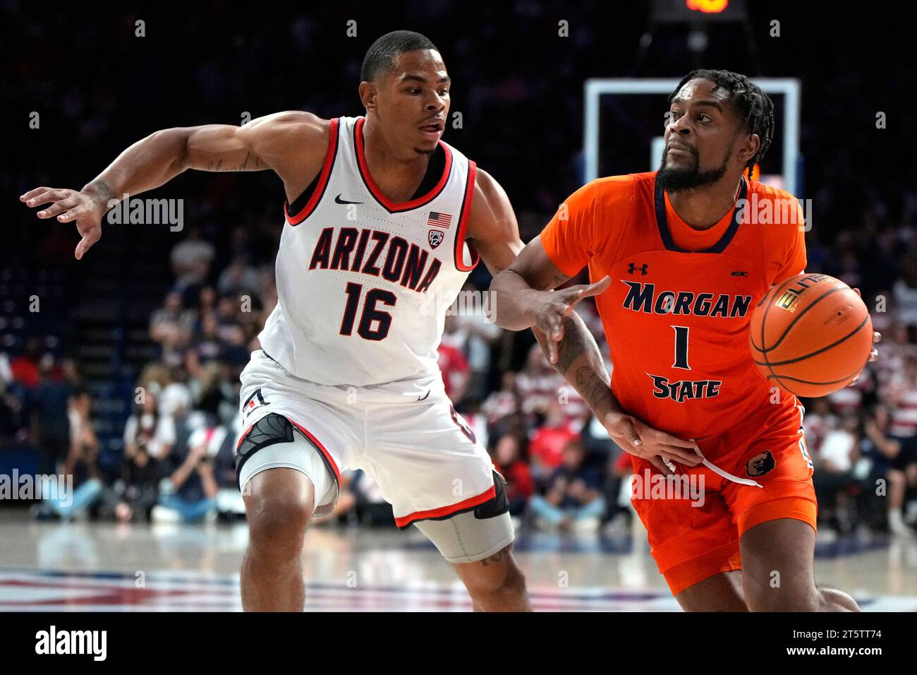 Morgan State guard Wynston Tabbs (1) drives against Arizona forward Keshad Johnson during the ...