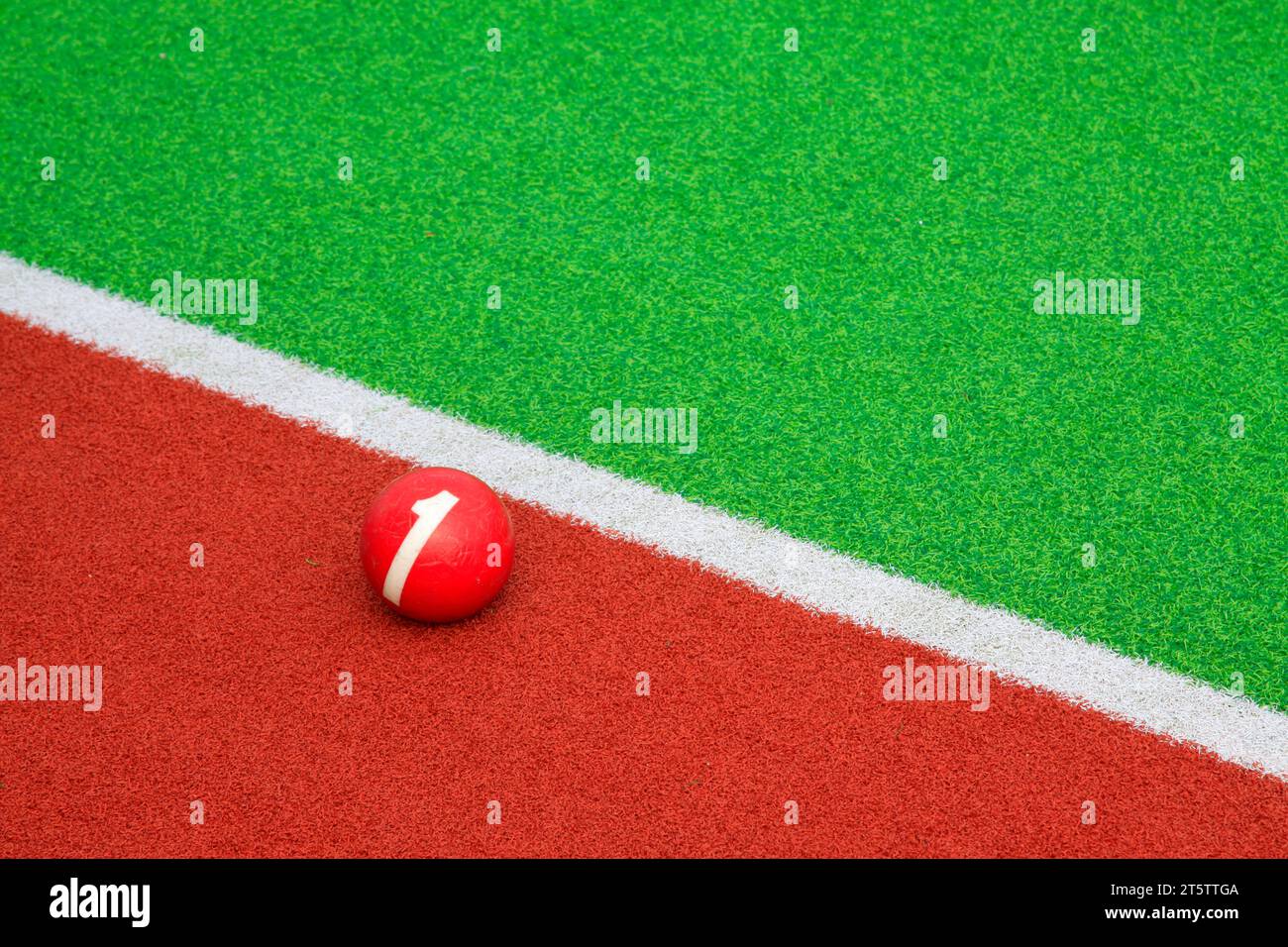 Chinese gate ball on the green plastic pitch, closeup of photo Stock ...