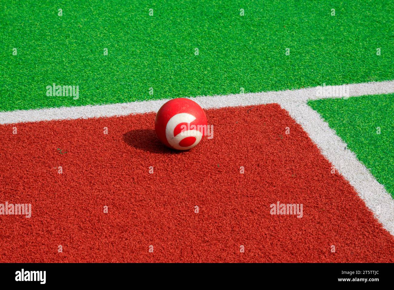 Chinese gate ball on the green plastic pitch, closeup of photo Stock ...