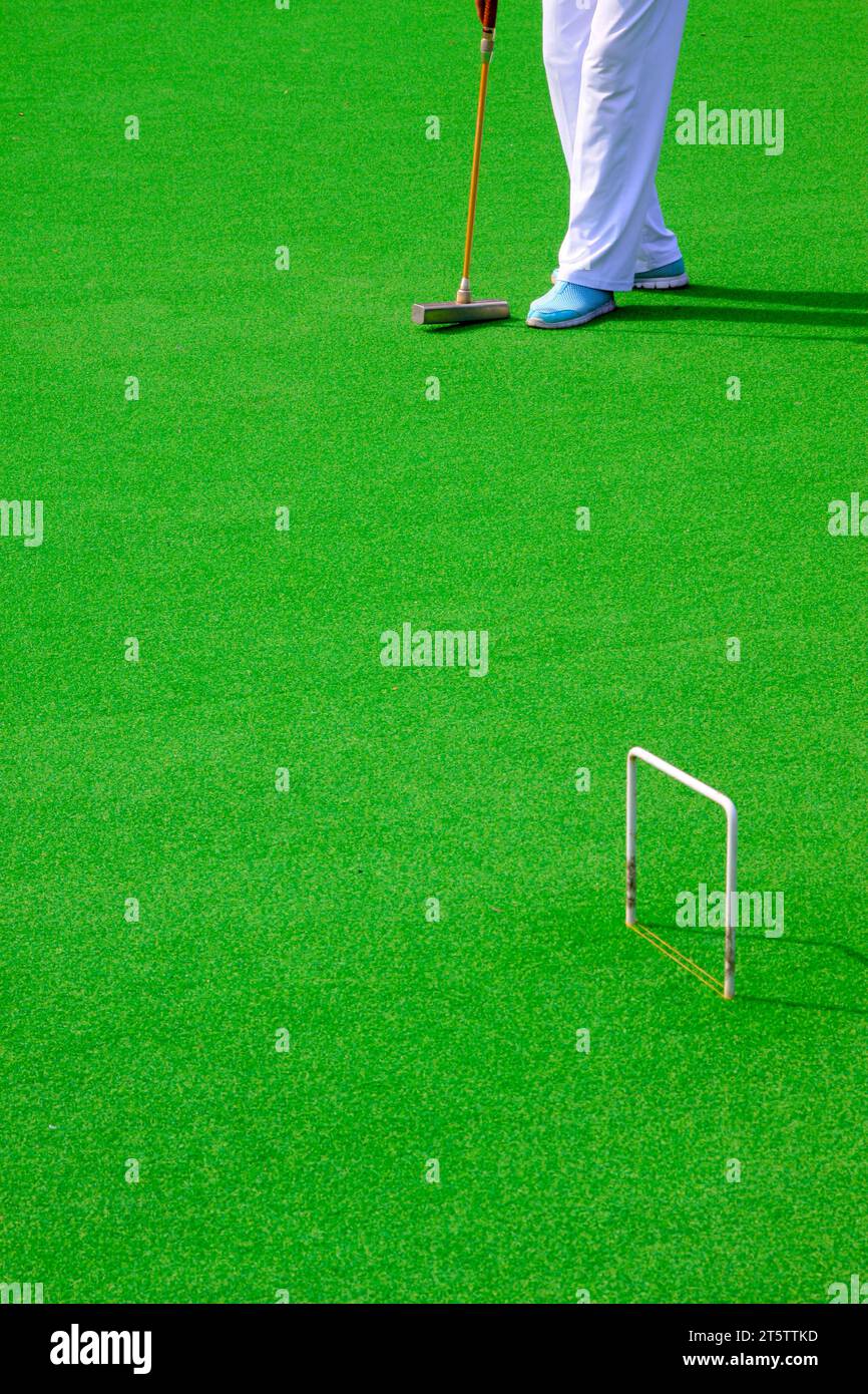 Chinese gate ball ball arm and athlete's legs, closeup of photo Stock ...
