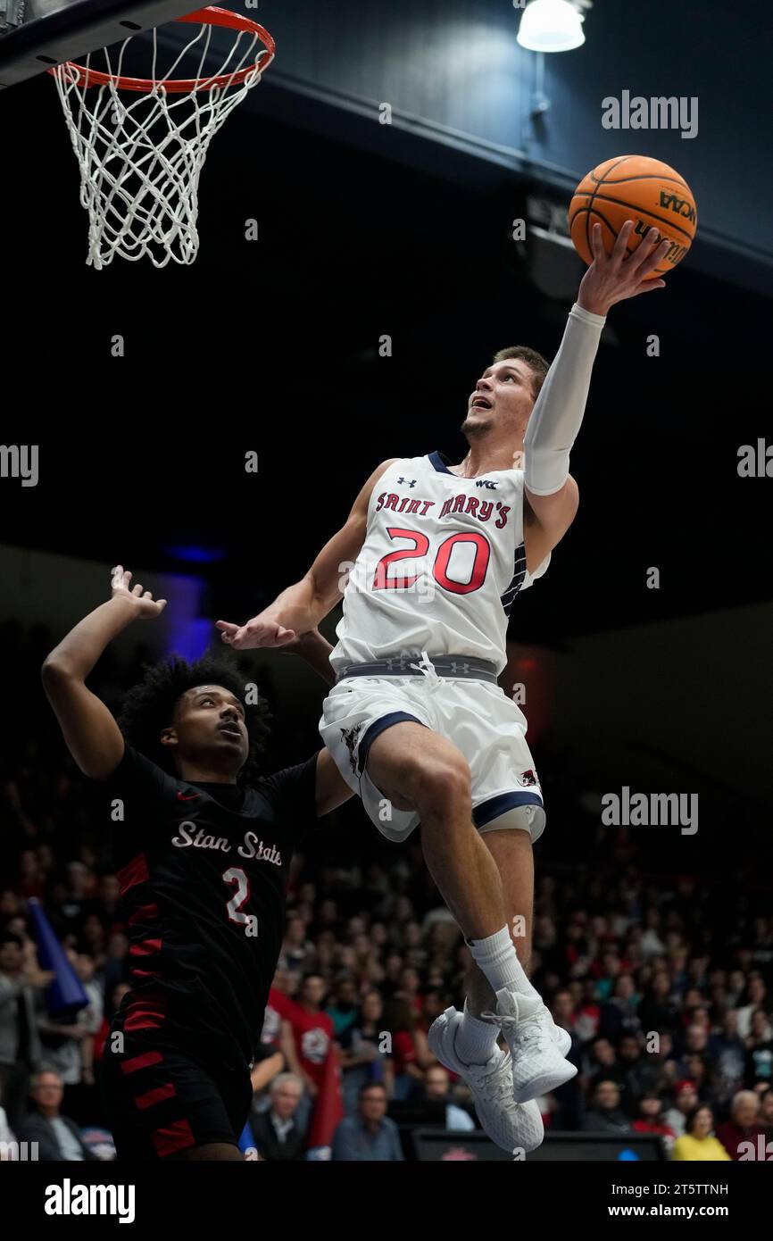Saint Mary's guard Aidan Mahaney (20) shoots next to Cal State ...
