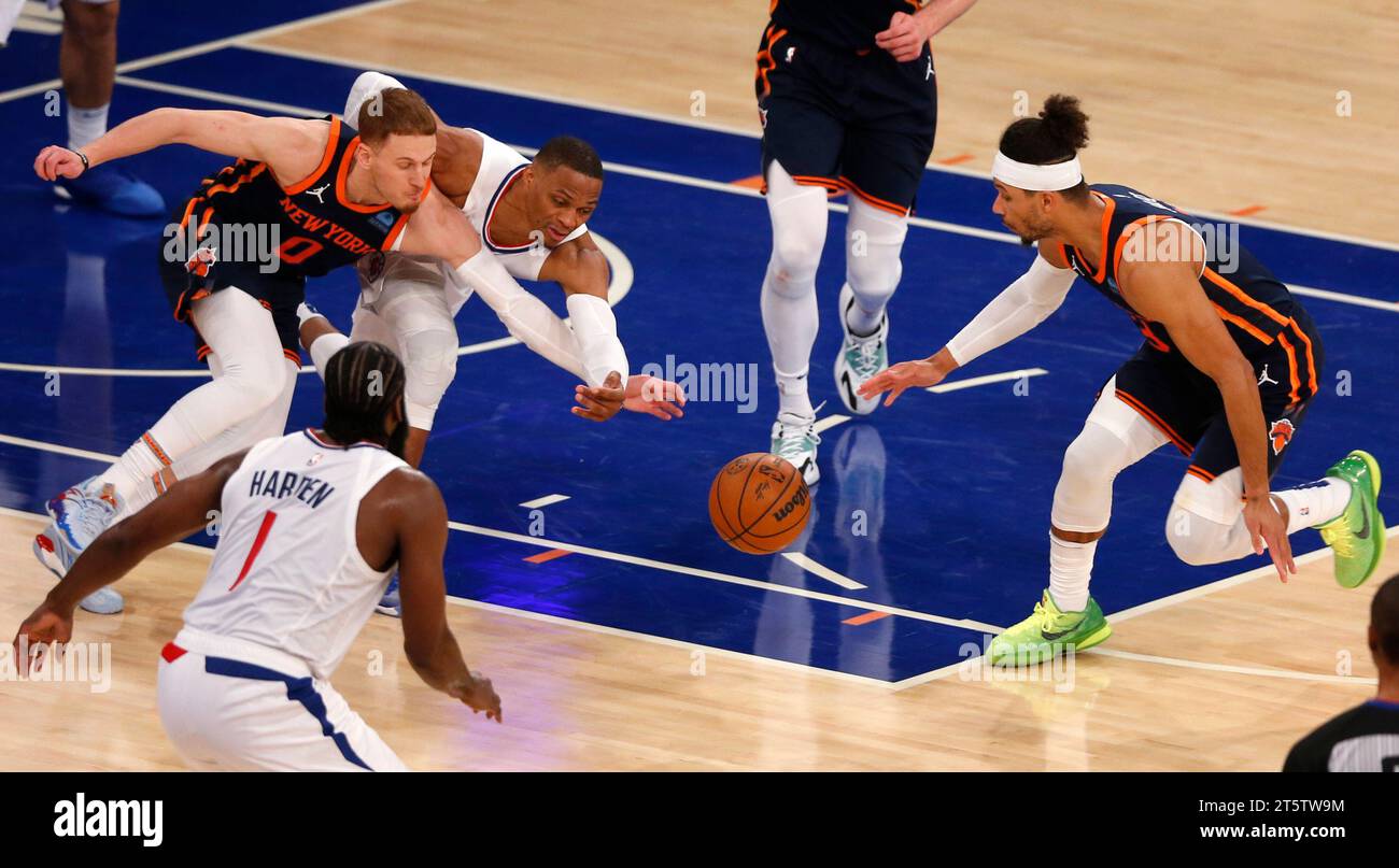 New York Knicks guards Donte DiVincenzo, left, and Josh Hart, right ...
