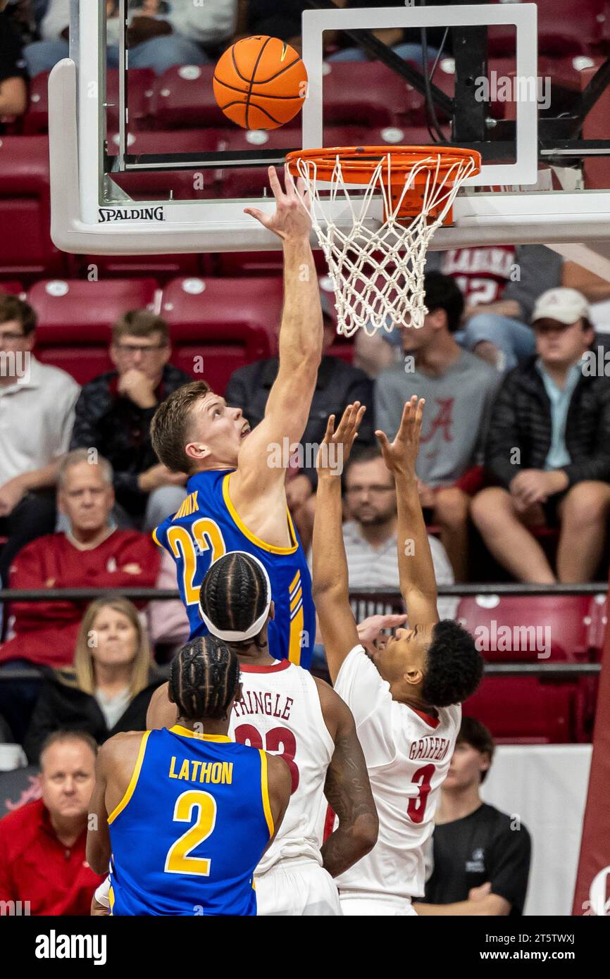 Morehead State guard Riley Minix (22) scores over Alabama guard Rylan ...