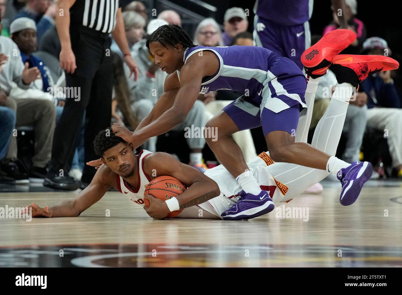 Southern California forward Arrinten Page, left, and Kansas State guard ...