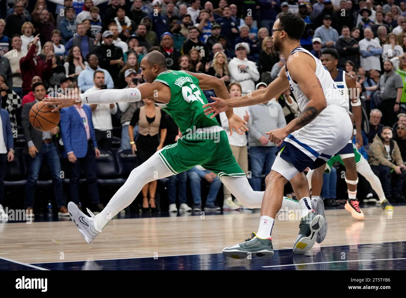 Boston Celtics center Al Horford, left, loses control of the basketball ...