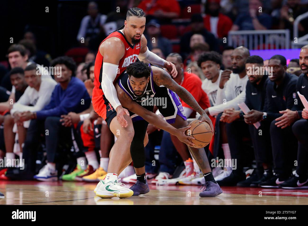 Sacramento Kings guard Malik Monk, bottom, looks for a way around ...