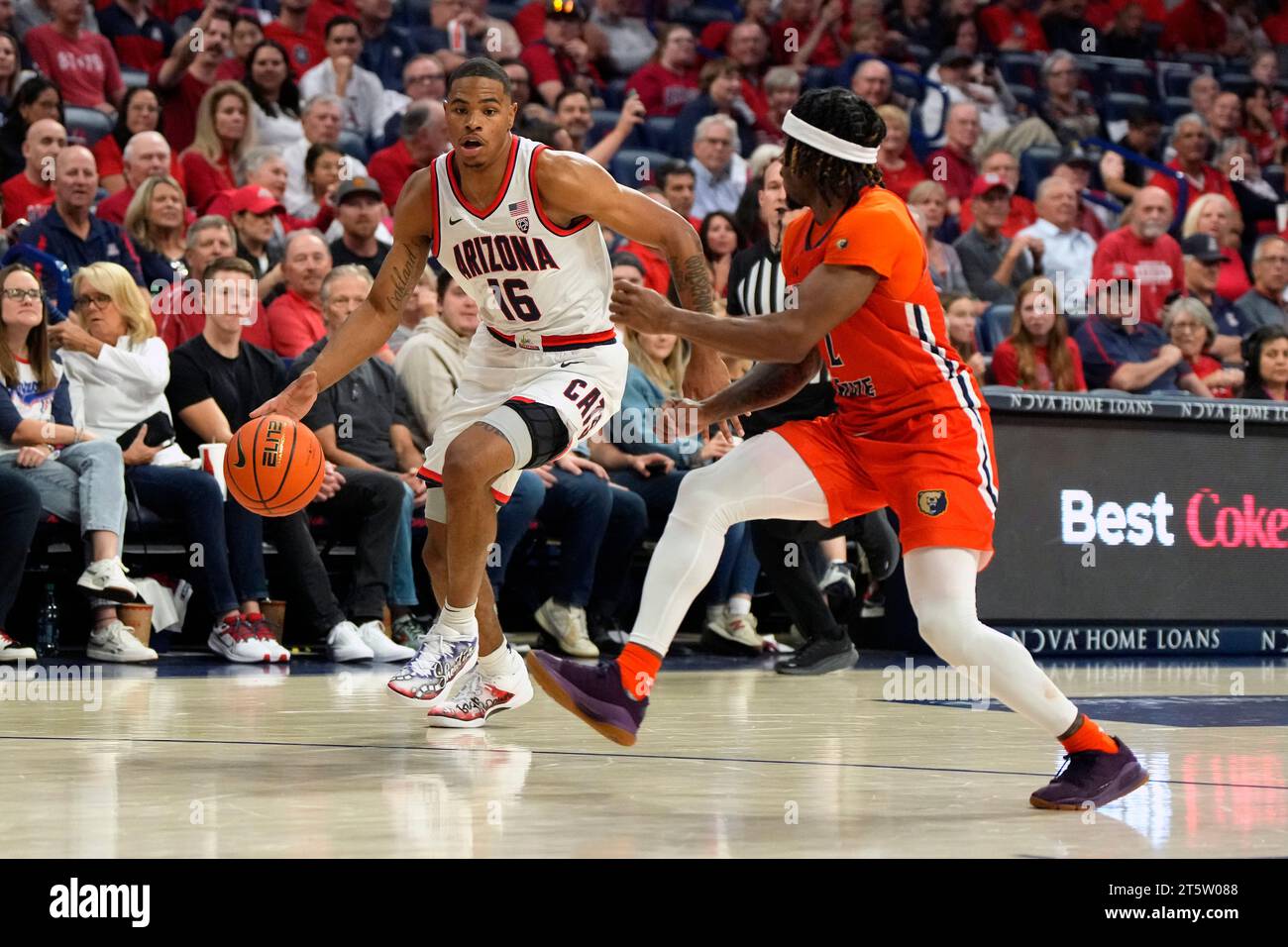 Arizona forward Keshad Johnson (16) drives past Morgan State guard ...