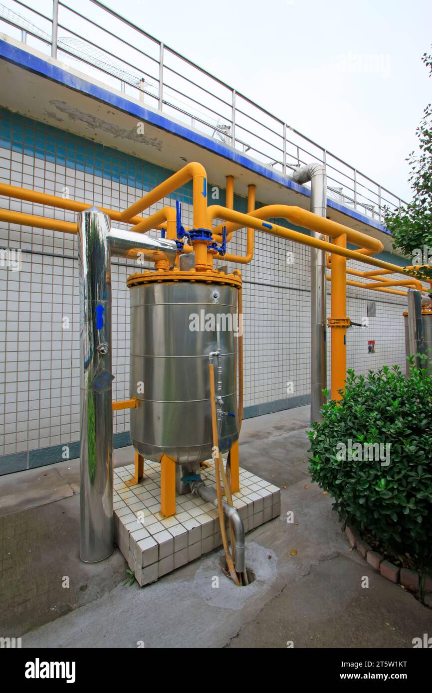 Warning signs in wastewater treatment plant water-sealed tank, closeup ...