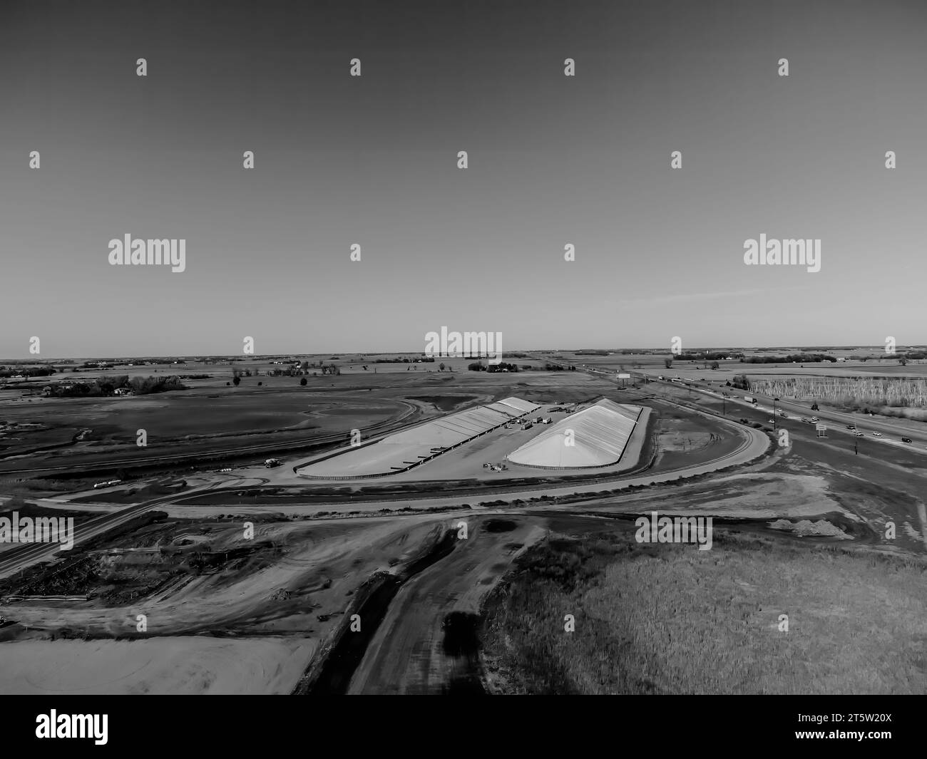 Drone view over two grain storage piles being filled and covered Stock ...