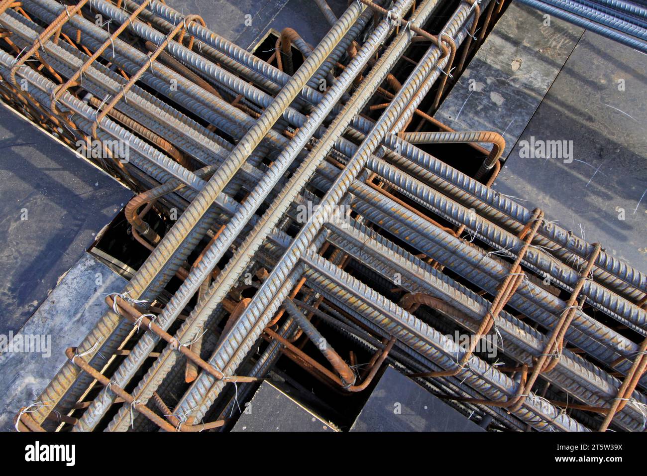 Steel binding in construction site, closeup of photo Stock Photo - Alamy