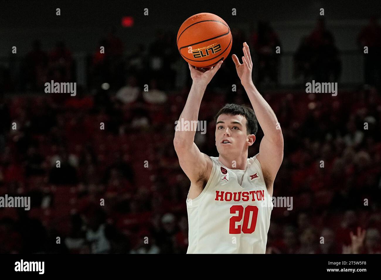Houston guard Ryan Elvin (20) shoots during the second half of an NCAA ...