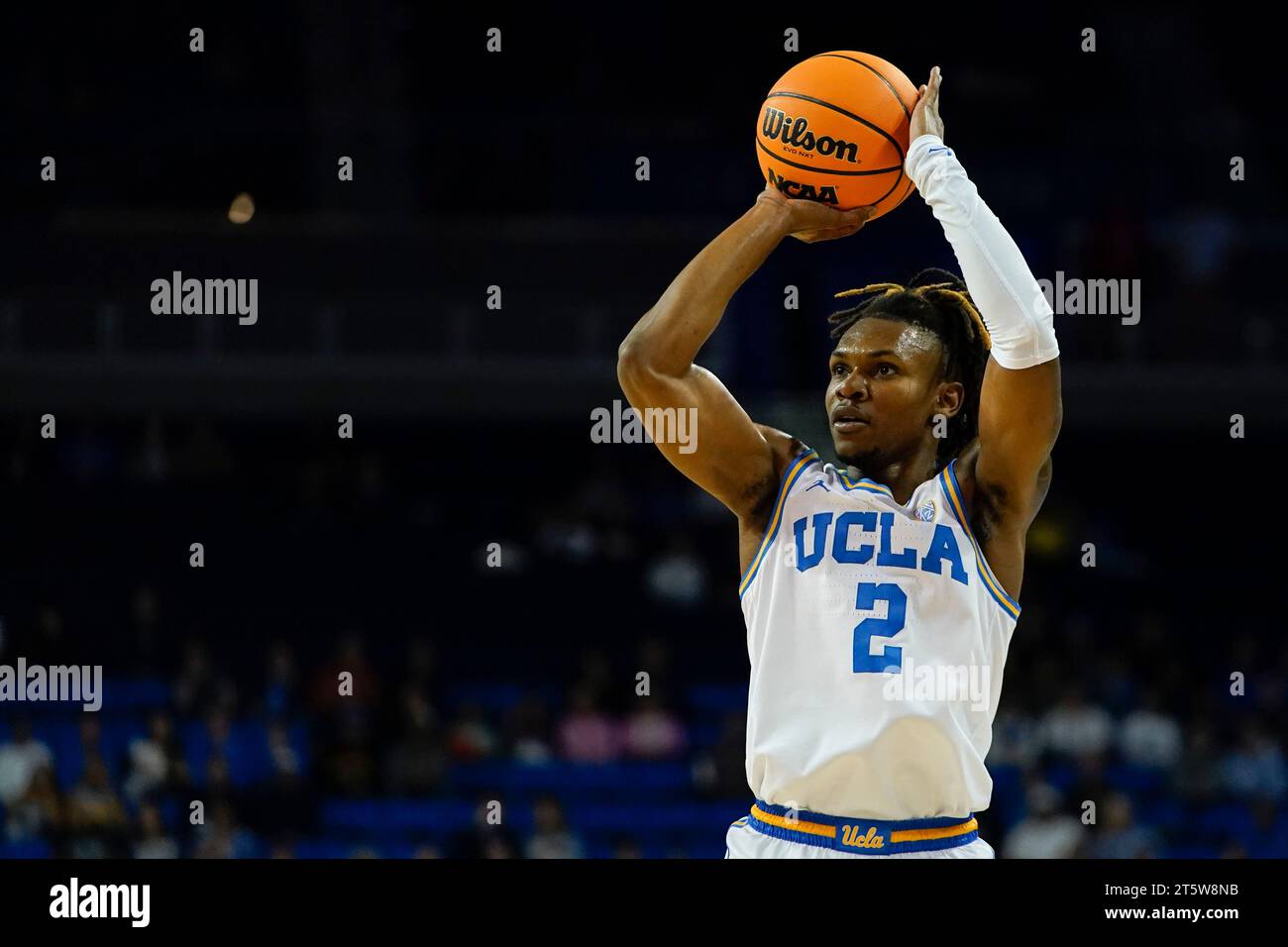 UCLA guard Dylan Andrews shoots during the first half of an NCAA ...