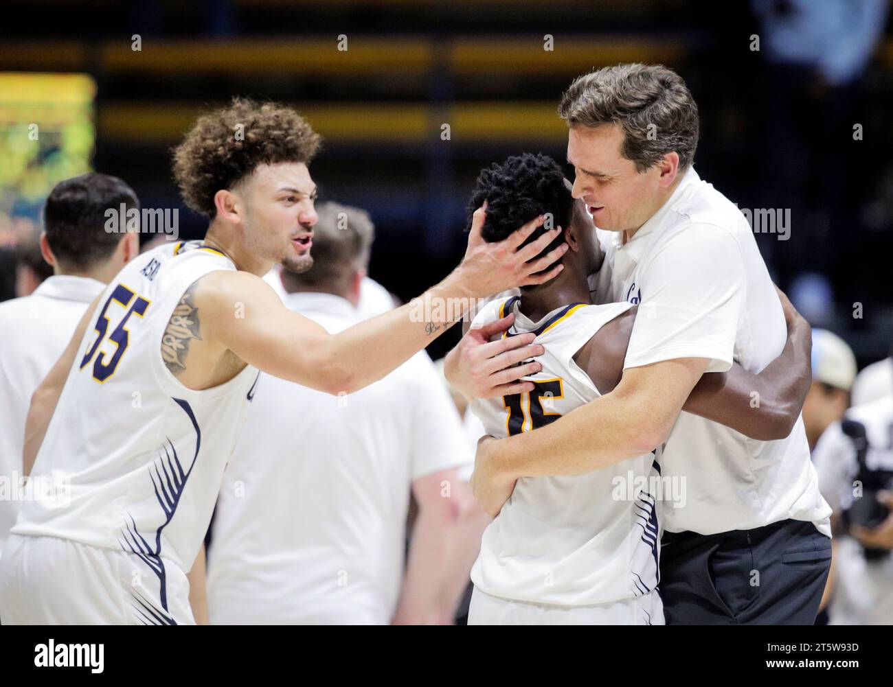 California head coach Mark Madsen, right, hugs Jalen Cone (15) after ...