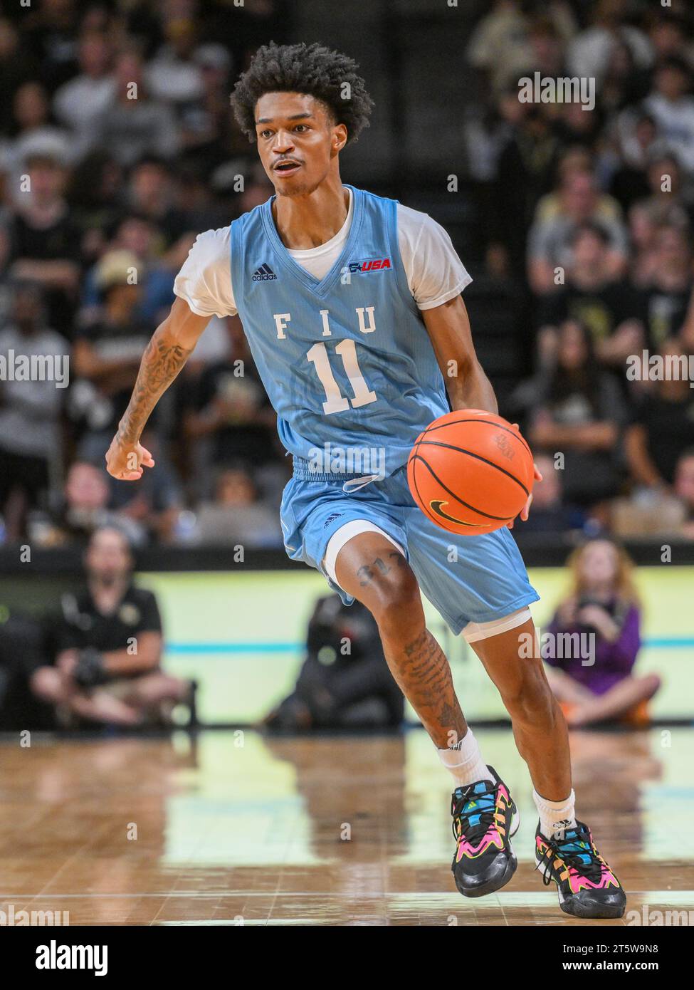 Orlando, FL, USA. 6th Nov, 2023. FIU guard Jayden Brewer (11) dribbles ...