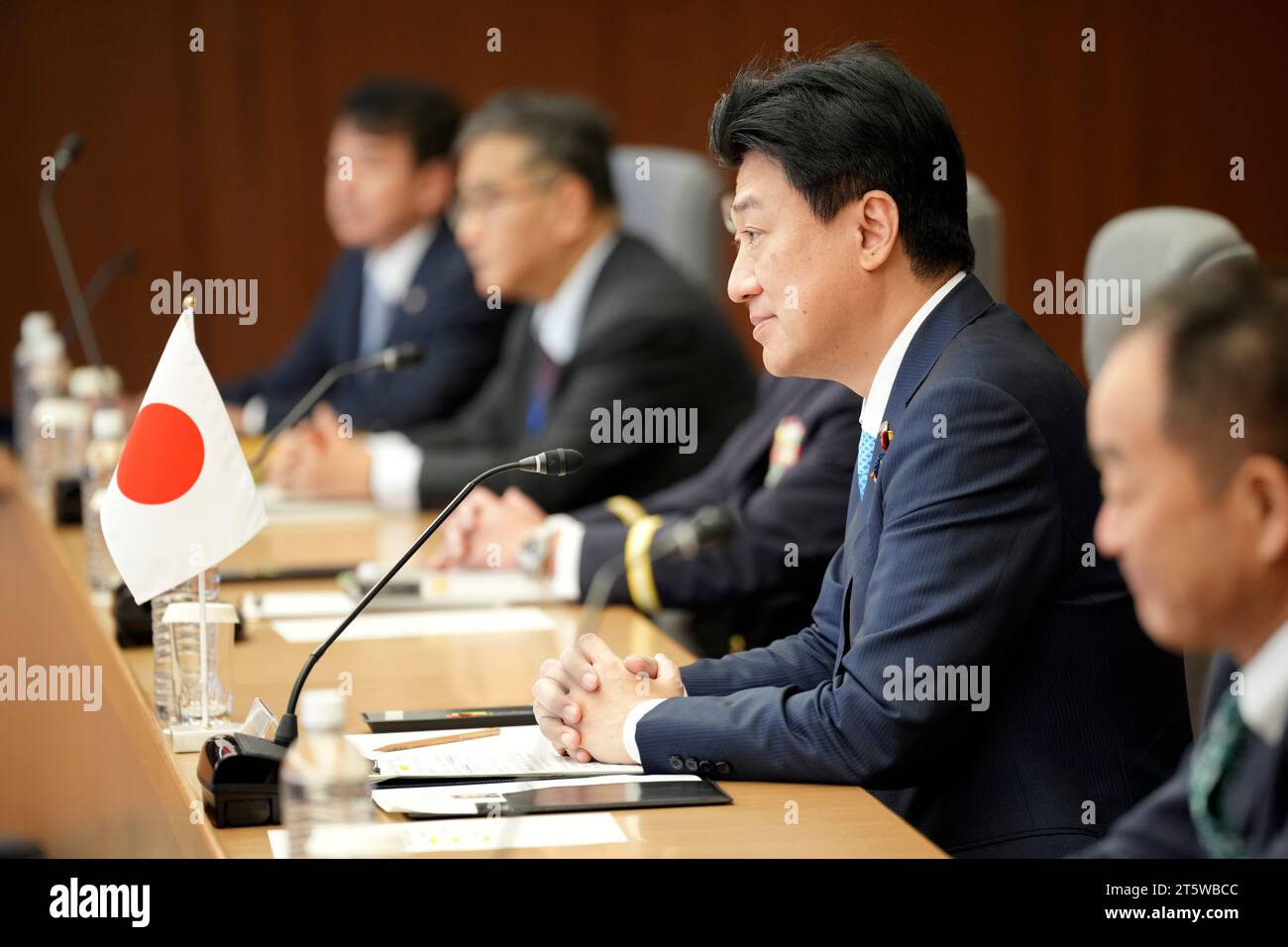 Japanese Defense Minister Minoru Kihara, second right, listens to ...