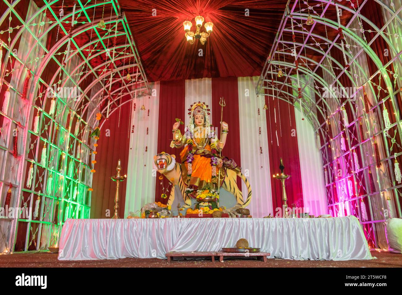 A beautiful idol of Maa Durga being worshipped at a pandal during ...
