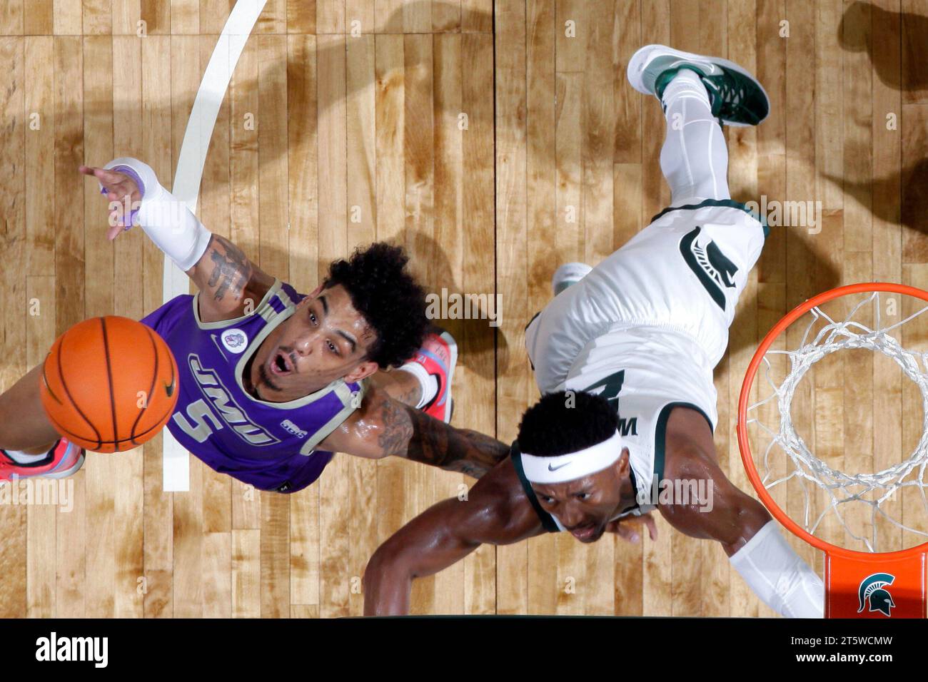 James Madison's Terrence Edwards Jr., left, and Michigan State's Tyson ...