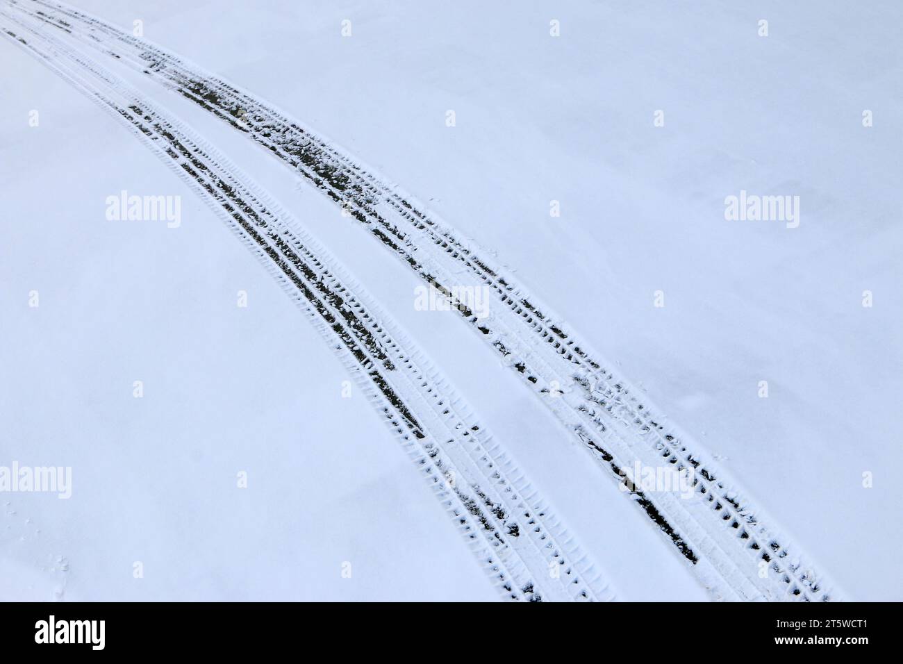 Wheel marks on the snow Stock Photo - Alamy
