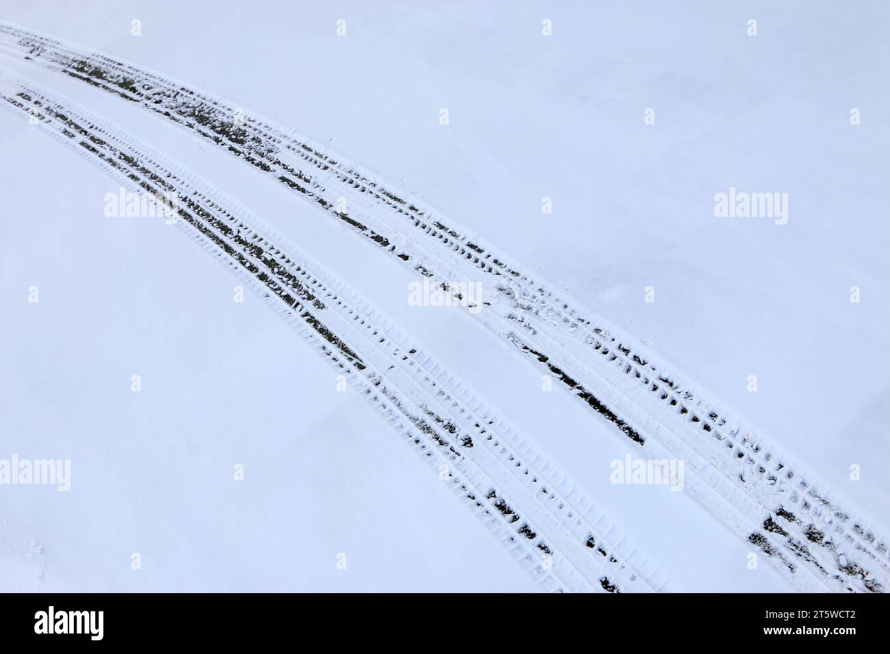 Wheel marks on the snow Stock Photo - Alamy