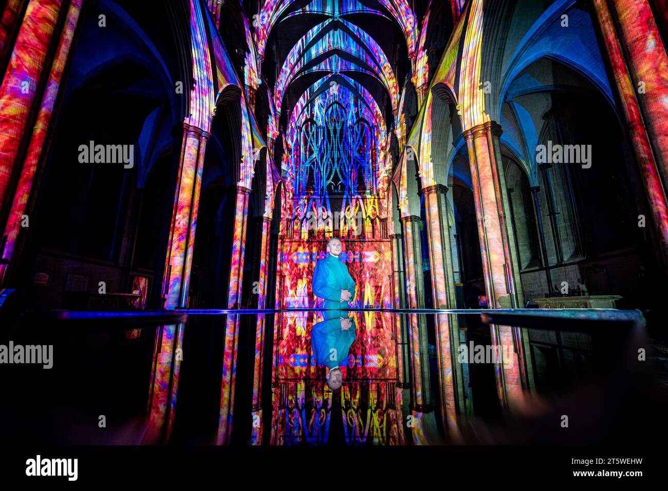 Salisbury Cathedral Senior Verger, Tyler Ringwood-Hoare, is reflected ...