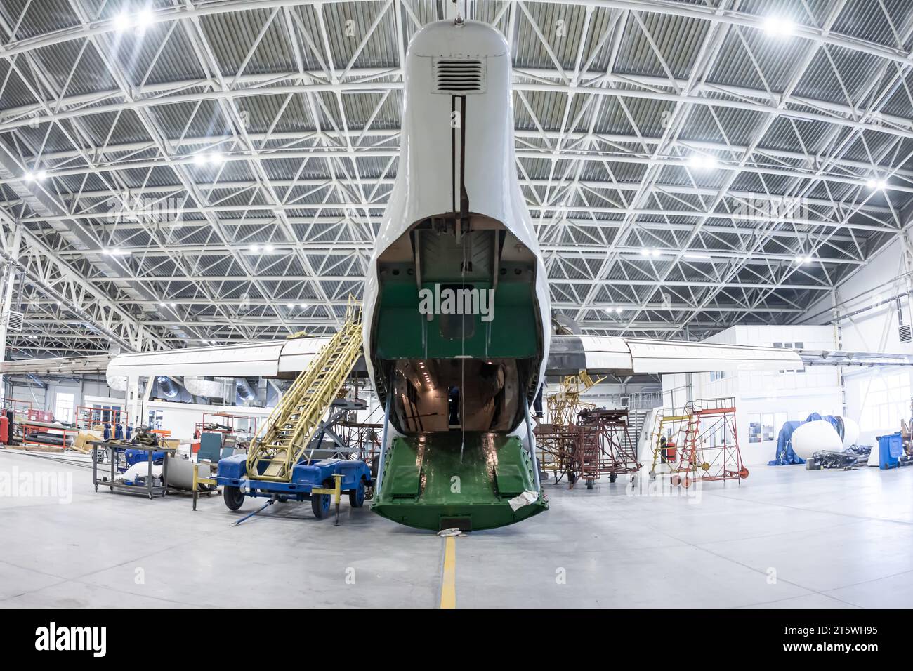 Rear view of a transport airplane with open cargo bay in an aviation ...