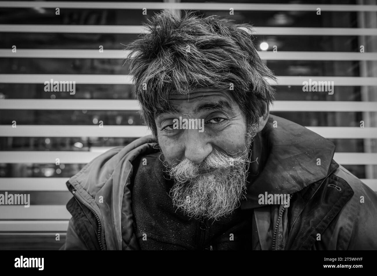 Portrait of a poor homeless man in black and white Stock Photo - Alamy