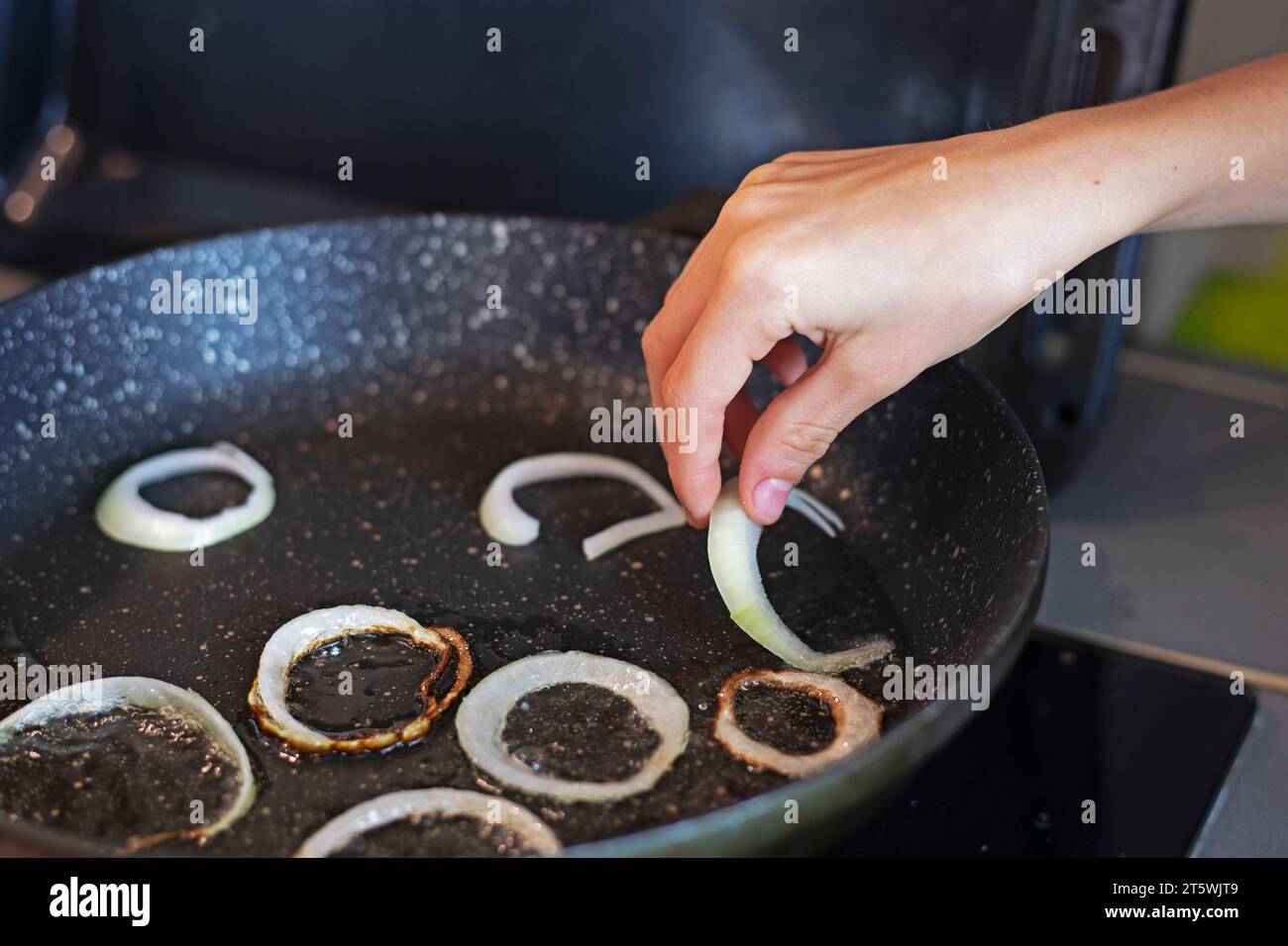 Cooking onion rings in oil hi-res stock photography and images - Alamy