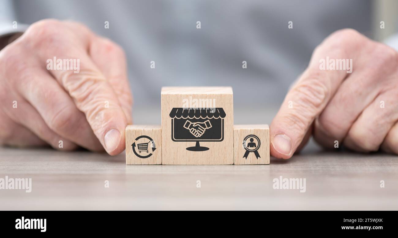 Wooden blocks with symbol of customer loyalty concept Stock Photo - Alamy