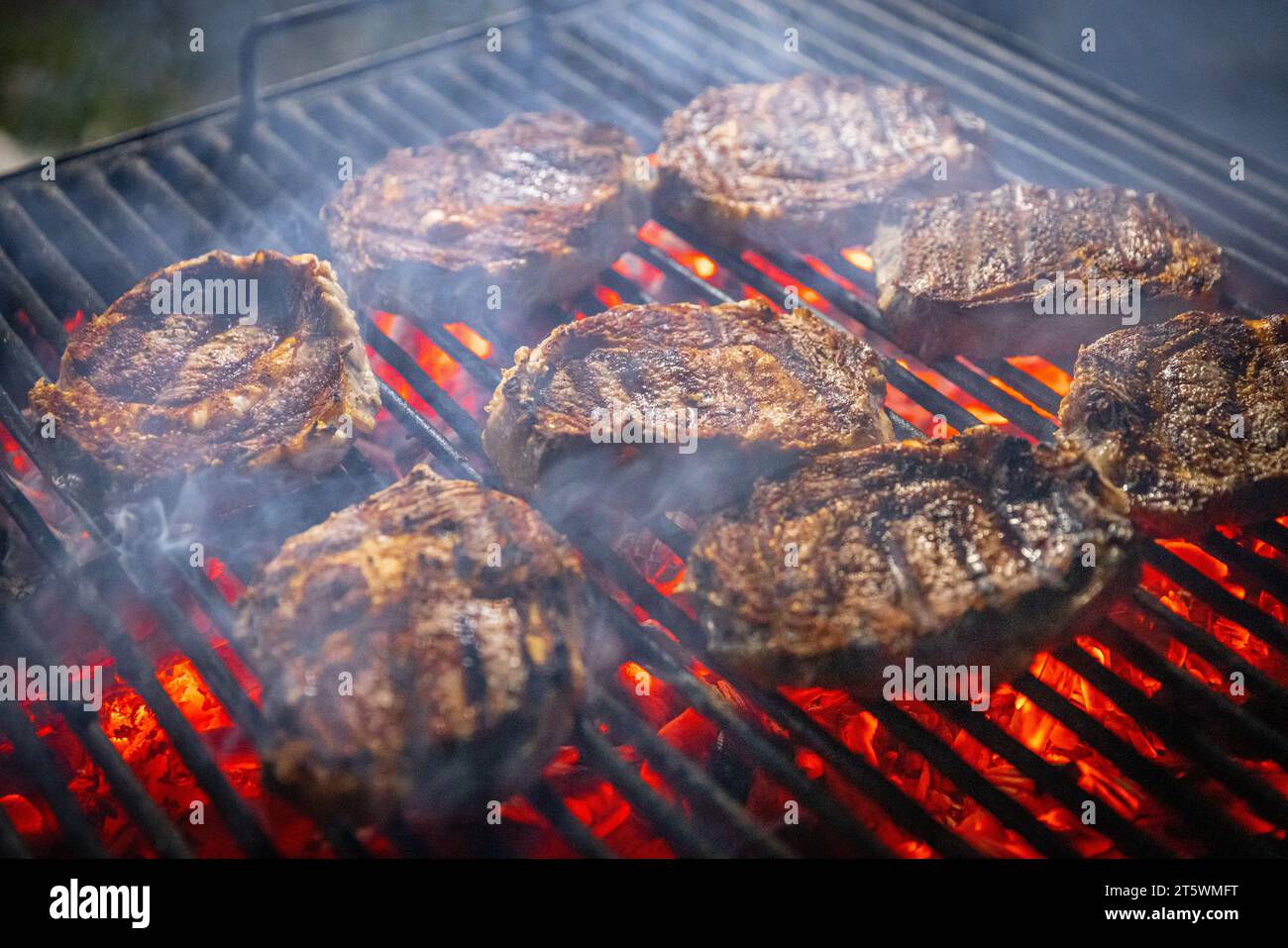 Australian beef steak on the charcoal bbq grill Stock Photo - Alamy
