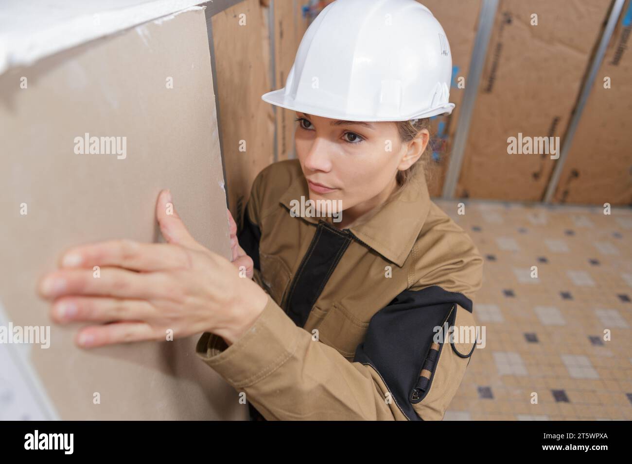 Female plasterer hi-res stock photography and images - Alamy