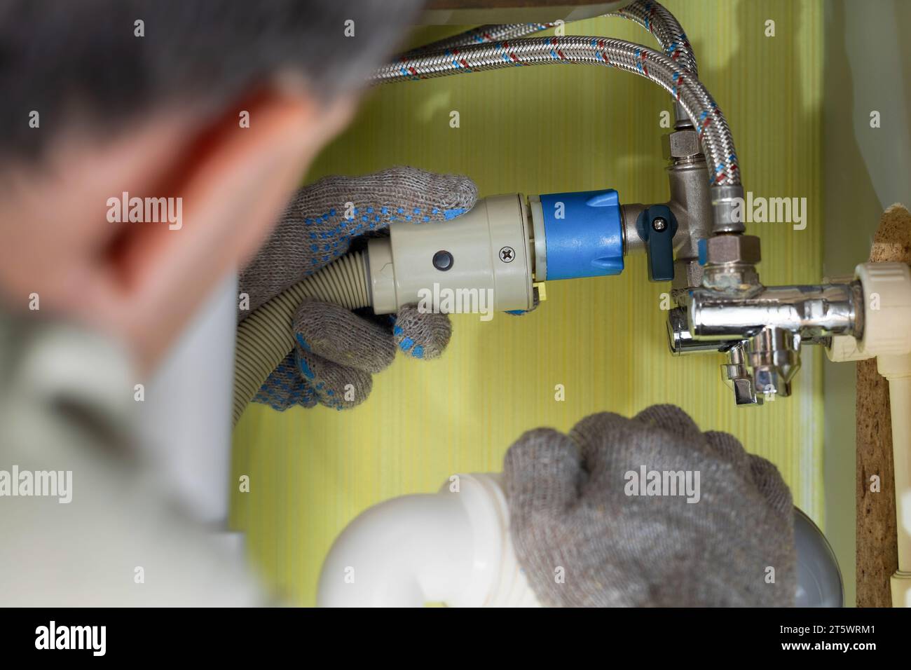 connecting the water supply hose for the washing machine. connecting a ...