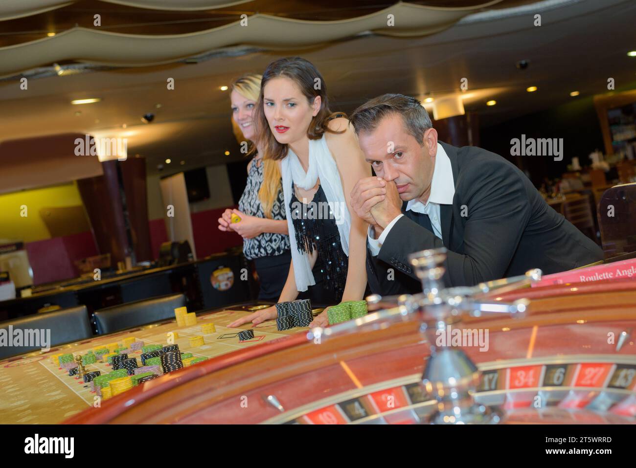 Man at roulette wheel hi-res stock photography and images - Alamy