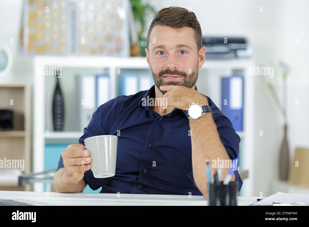 Construction worker is taking a break from work hi-res stock ...