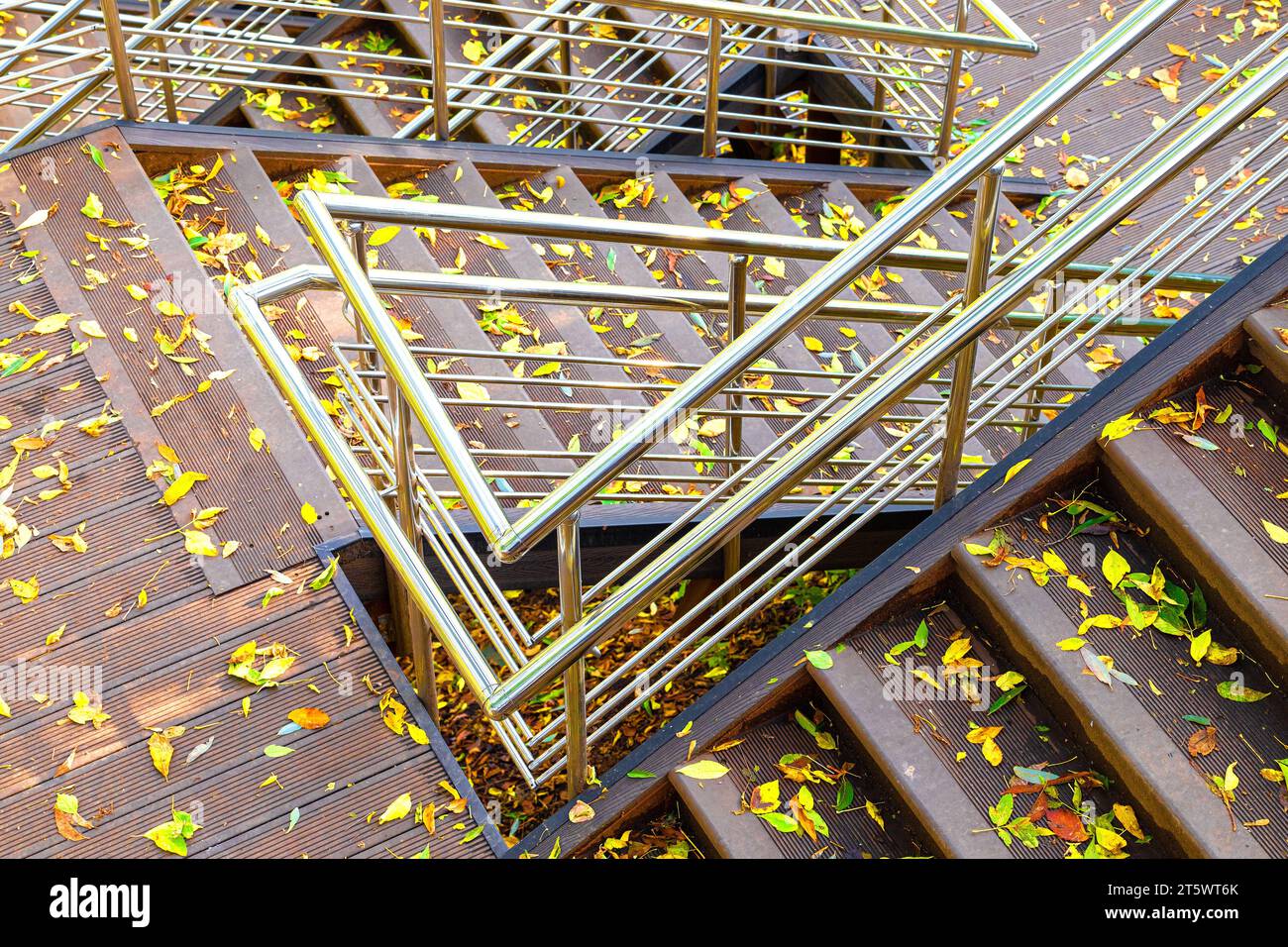 metal railings on the stairs in the park. the high staircase in the ...