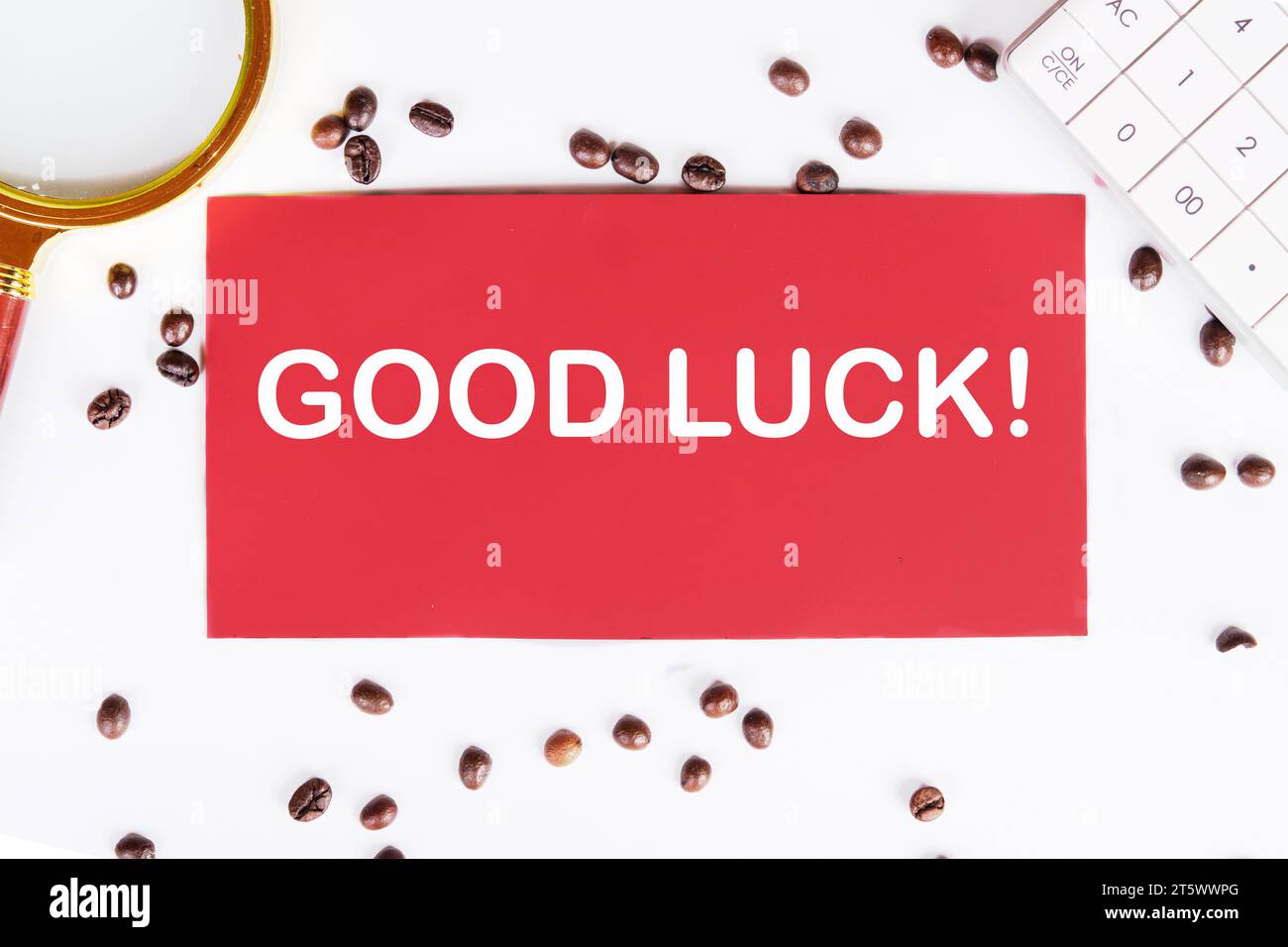Good luck writing on a red card on a white background with coffee beans ...